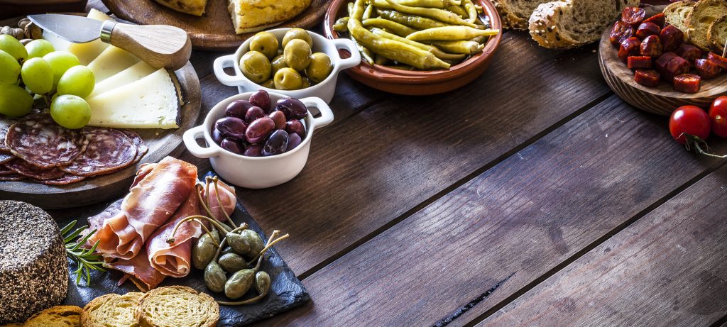 Tapas frame on rustic wooden table | DiCarlo Foods